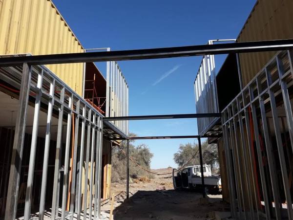 Foto: Diseñando el Espacio Intermedio de Minimal Construccion ...